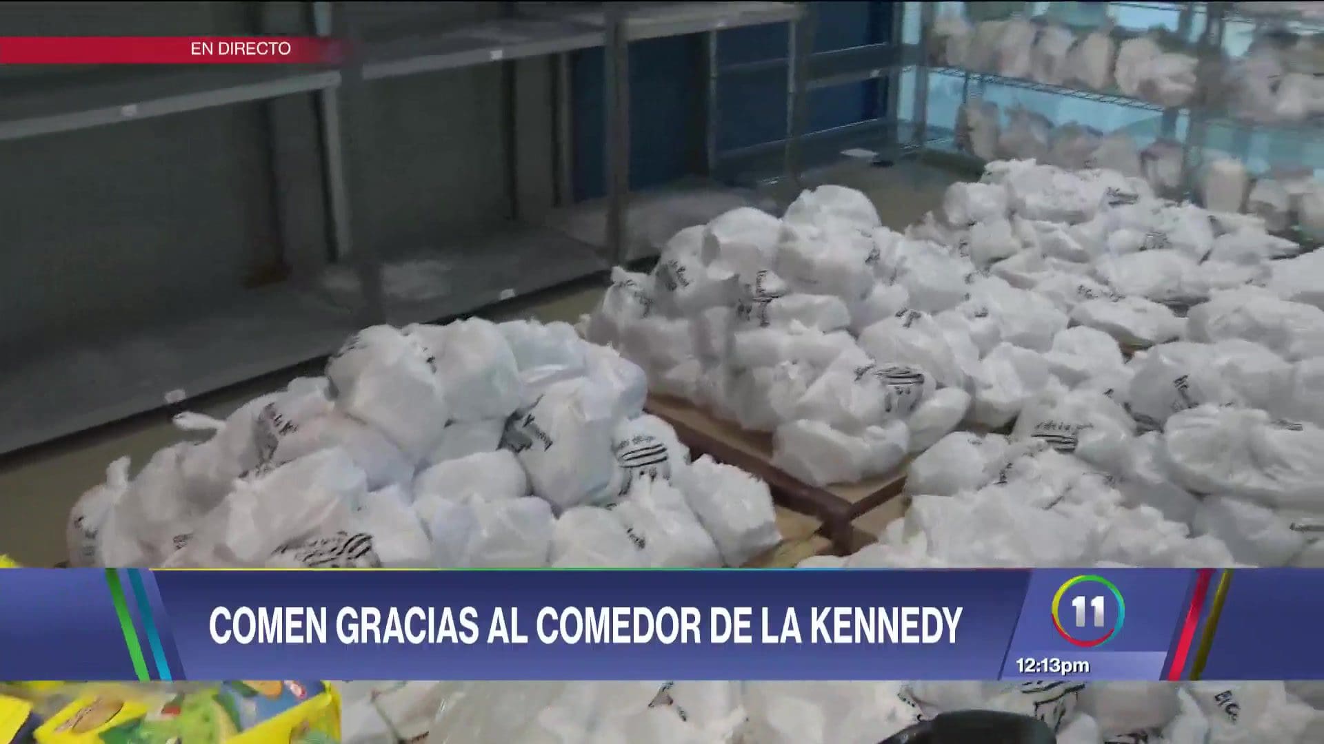 Voluntarios sirven comida en el Comedor de la Kennedy - TeleOnce TV ...